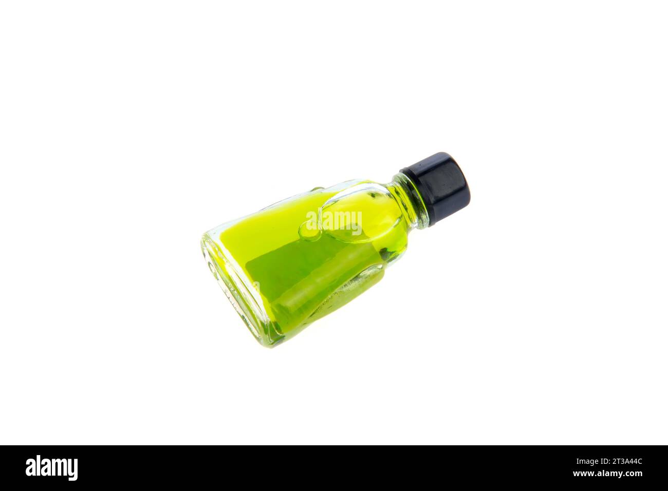 green liquid in glass bottles on a white background Stock Photo - Alamy