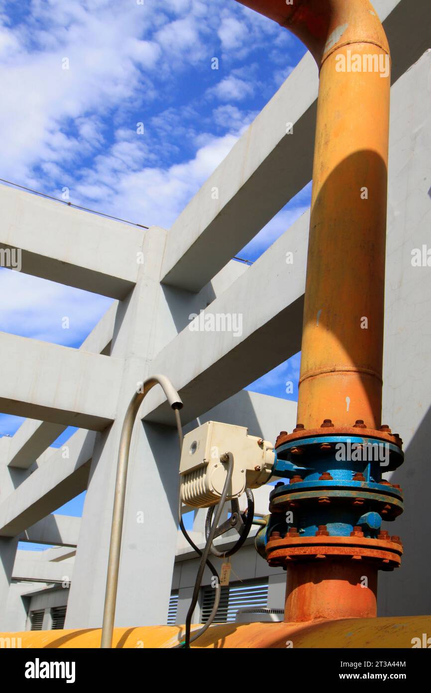 Metal pipe vent in an old factory Stock Photo - Alamy