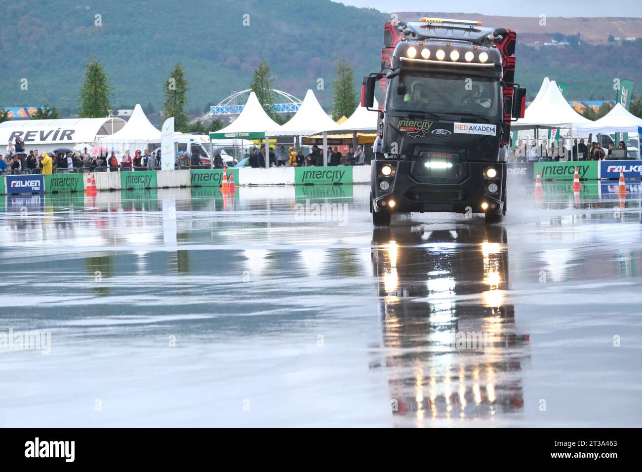 Ford brand Truck spectular drift activity on wet floor at Intercity ...