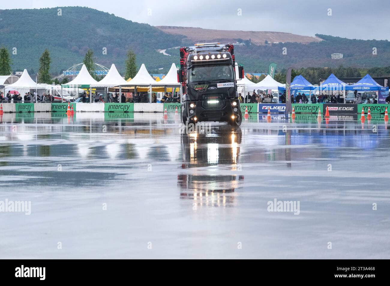 Ford brand Truck spectular drift activity on wet floor at Intercity ...