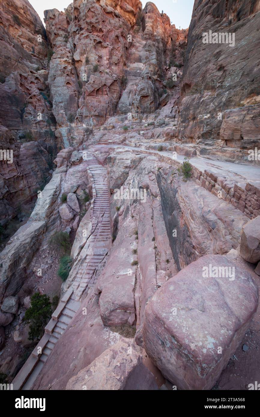 Stairs in the rock along Al Kubtha Trail (Indiana Jones Trail) leading ...