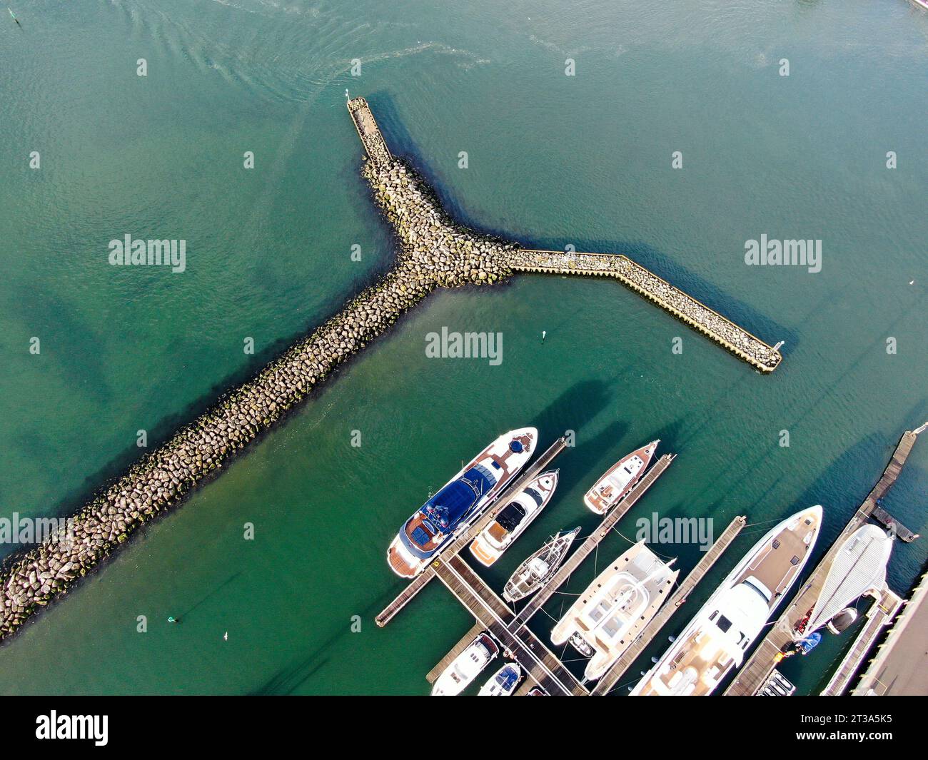 Aerial view of a marina with expensive yachts looking from directly ...