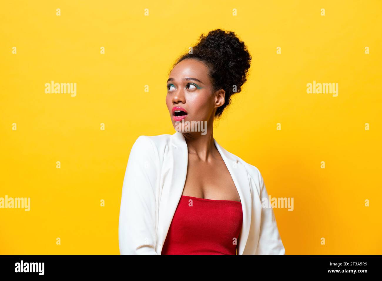 Fashionable African American woman with colorful makeup expressing ...