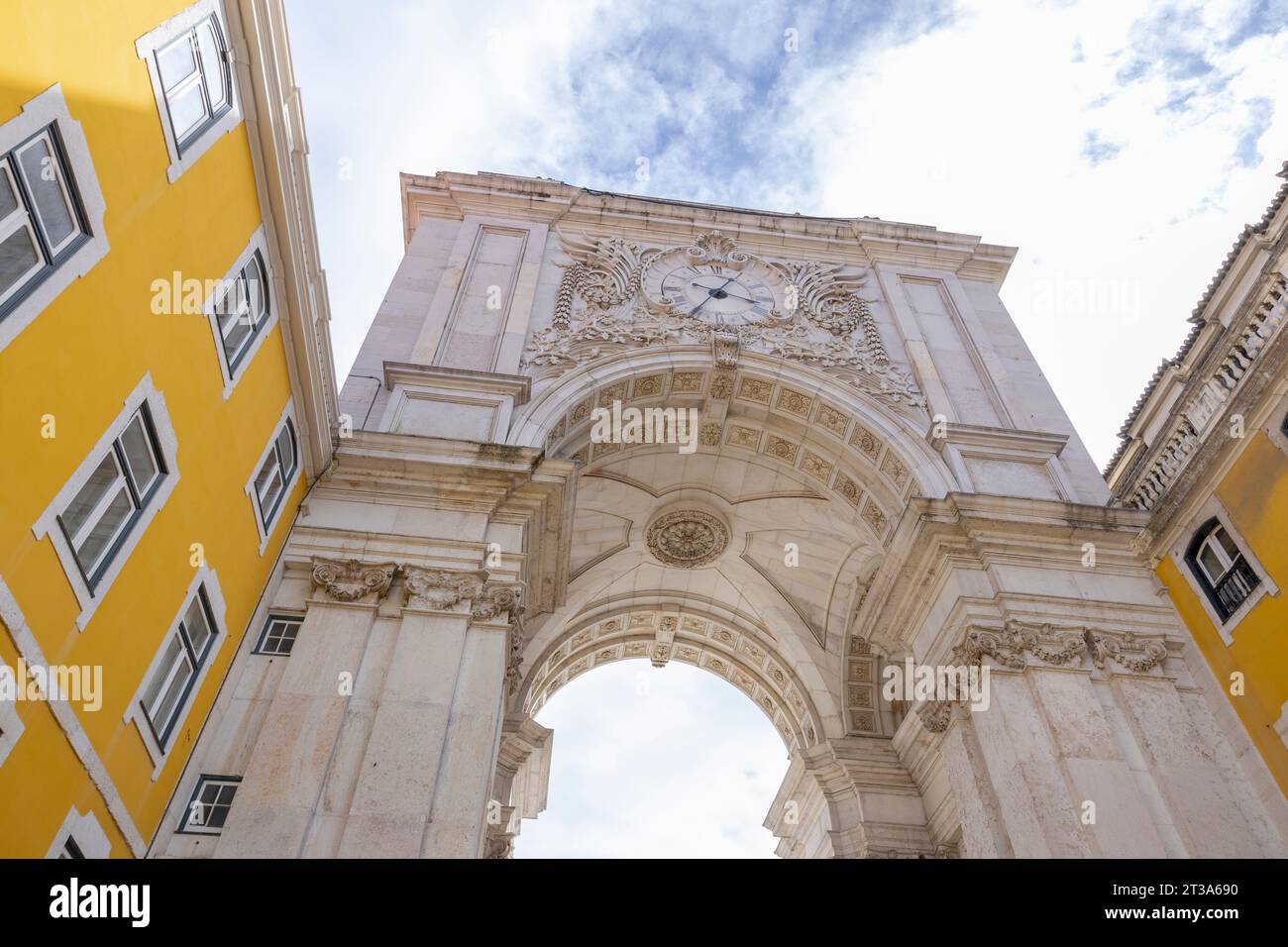 The magnificent architecture in Rua Augusta Arch with the clock, viewed ...