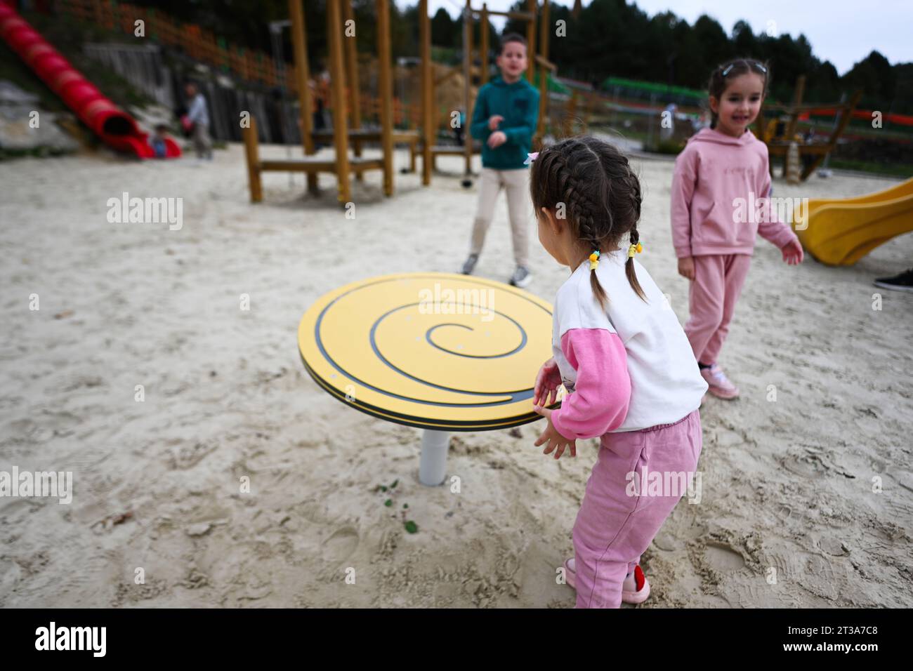Children playing on the playground at the day time Stock Photo - Alamy