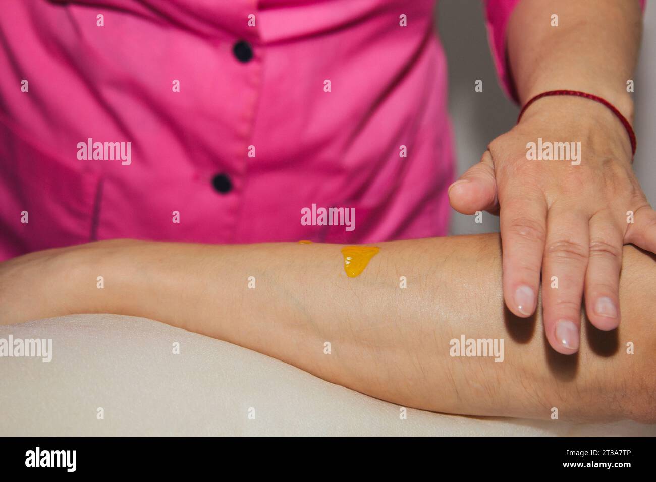 professional therapeutic hand massage using massage oil. woman doctor ...