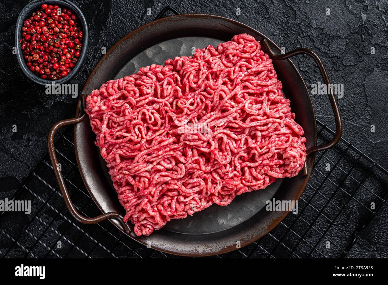 Raw beef and lamb Minced Meat, fresh ground meat. Black background. Top ...