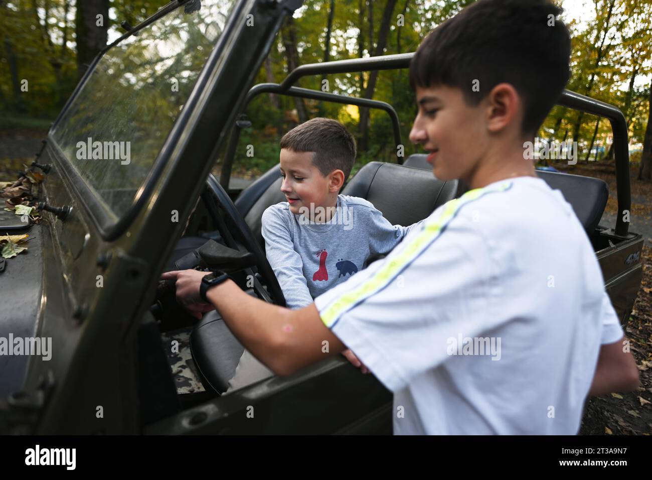 Two boys driving hi-res stock photography and images - Alamy