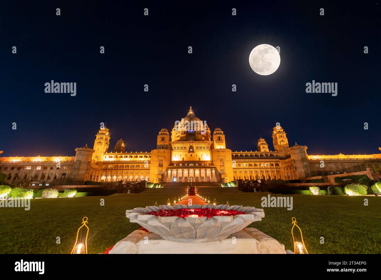 The night view of the hotel is beautiful, with the moon in the sky. Taj ...