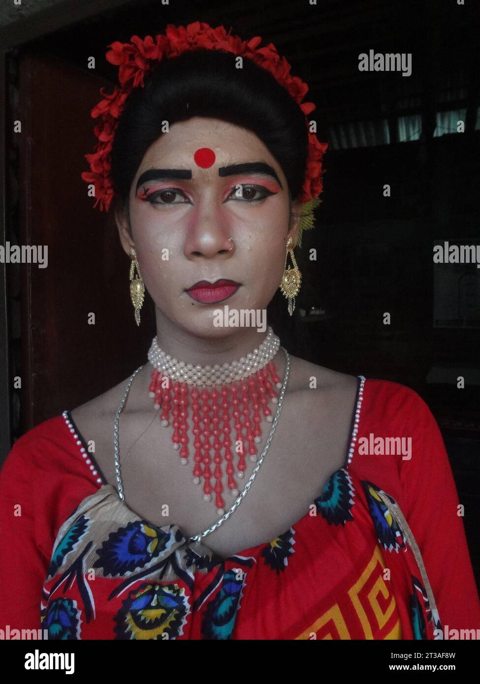 Kushtia, Bangladesh. 24th Oct, 2023. Shojib (18), a (pala gaan) folk performer poses for a photo ...