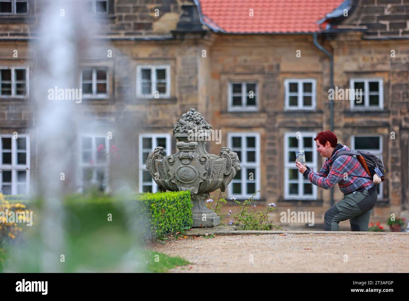 Blankenburg, Germany. 24th Oct, 2023. A woman takes a photo in the ...