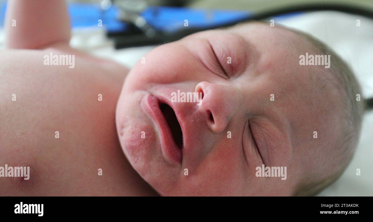 Portrait of newborn infant baby first hours of life at hospital Stock ...