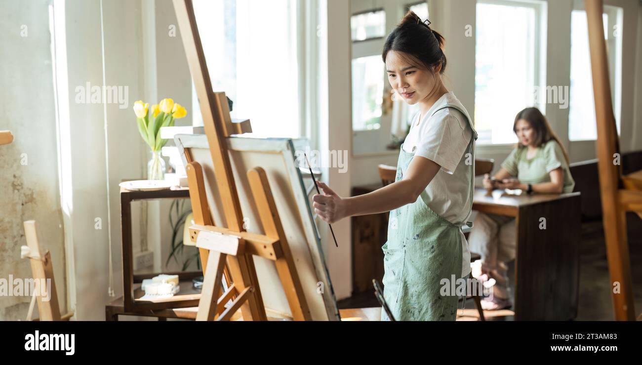 Talented Female Artist Working on a artist lifestyle. painting hobby ...