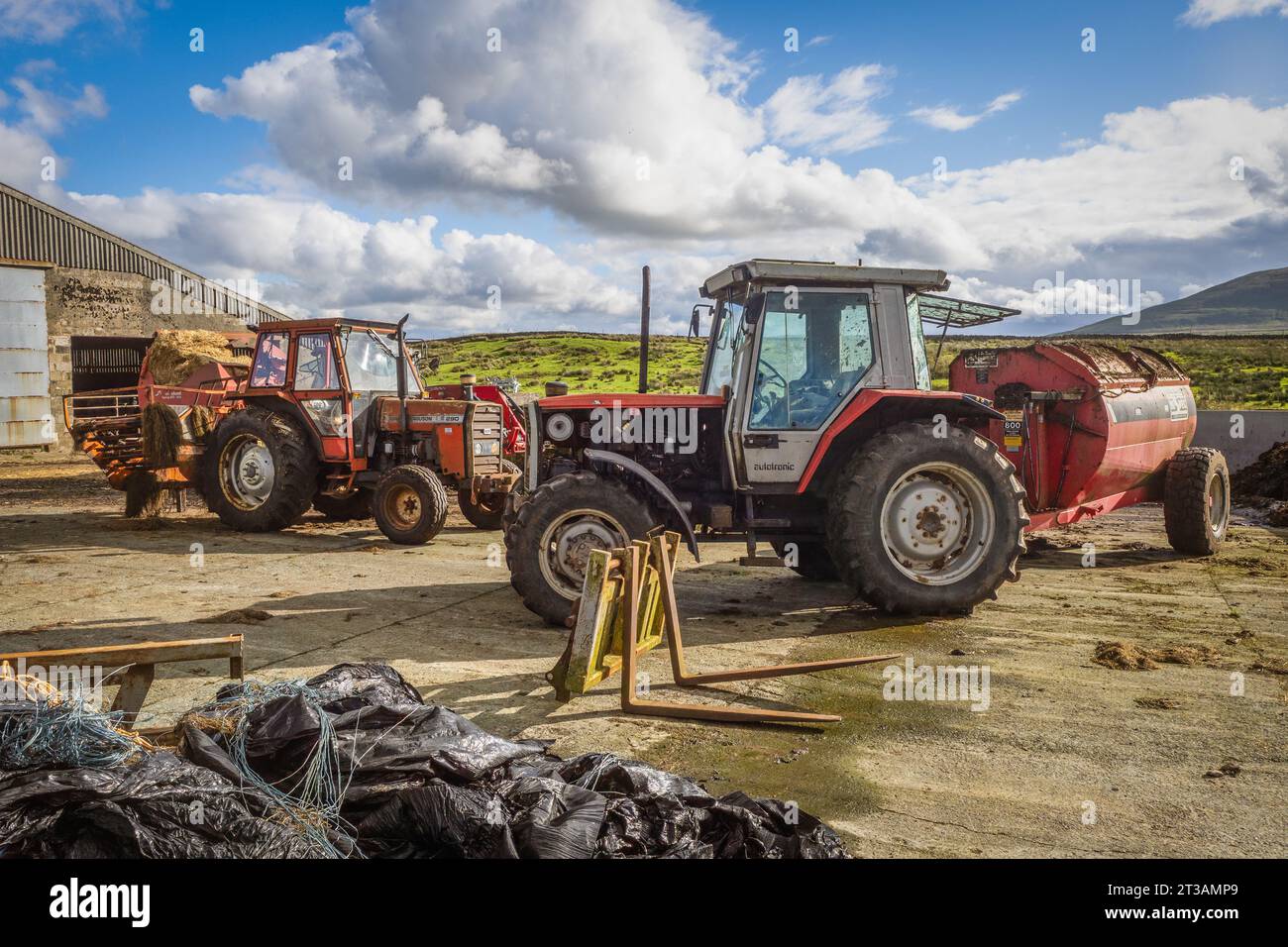 22.10.23 Ribblehead, North Yorkshire, UK. Red tractors parked at a farm ...