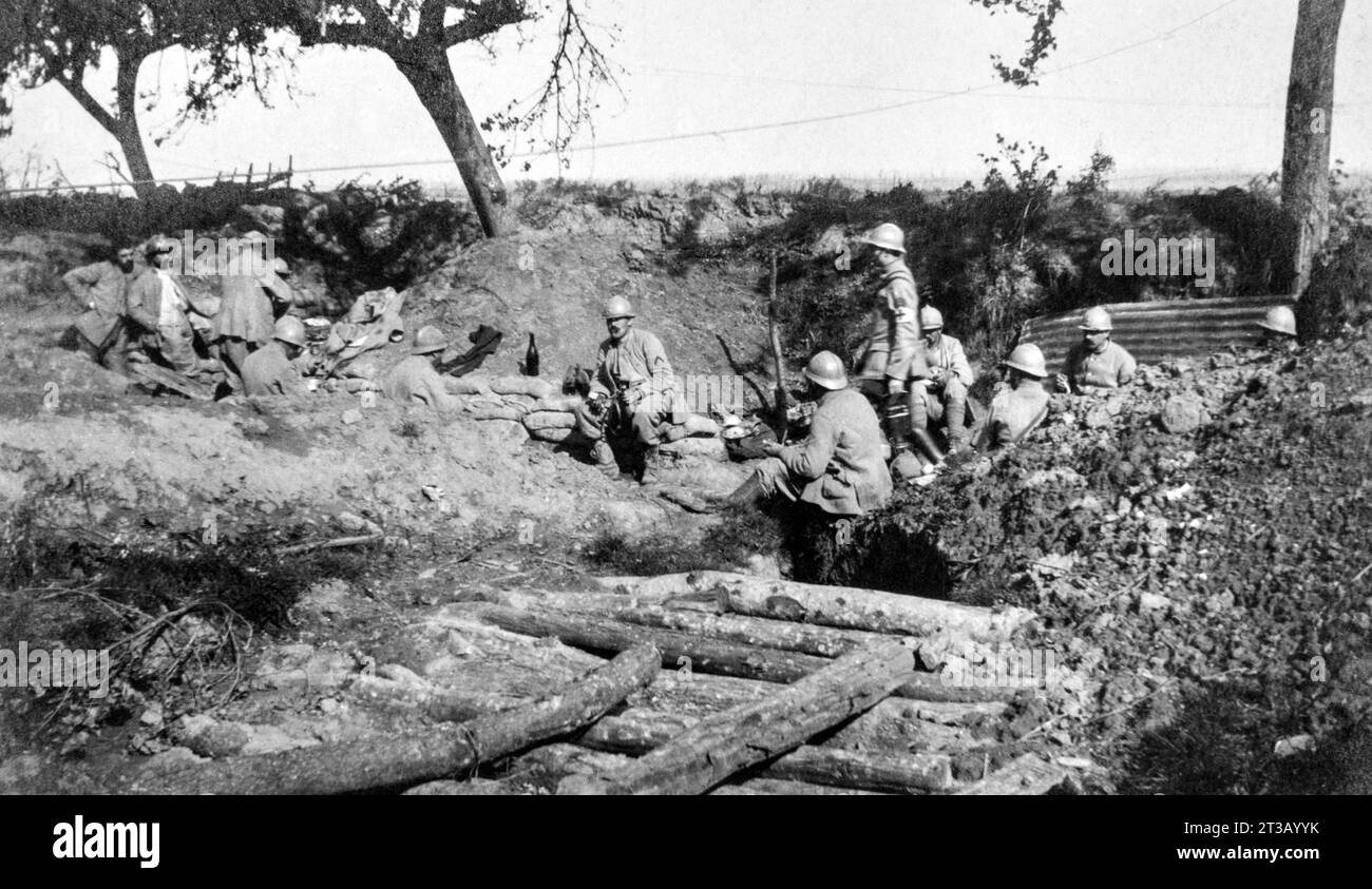 French soldiers at soup time in a trench during the first world war ...