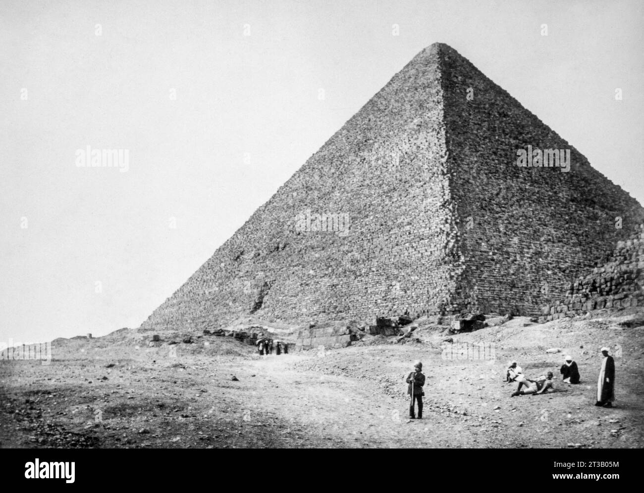 Photography of an archaeologist posing in front of the pyramid of ...