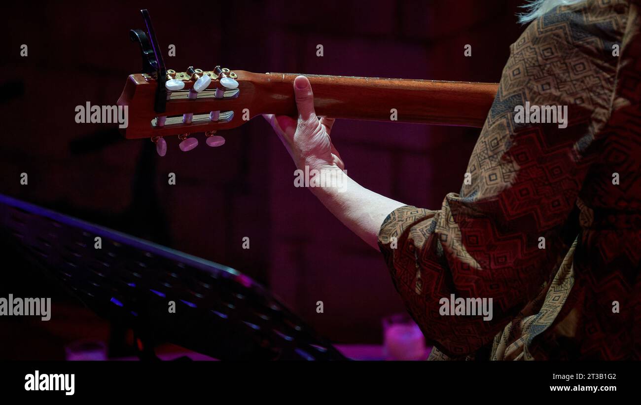Guitarist playing on six string hi-res stock photography and images - Alamy