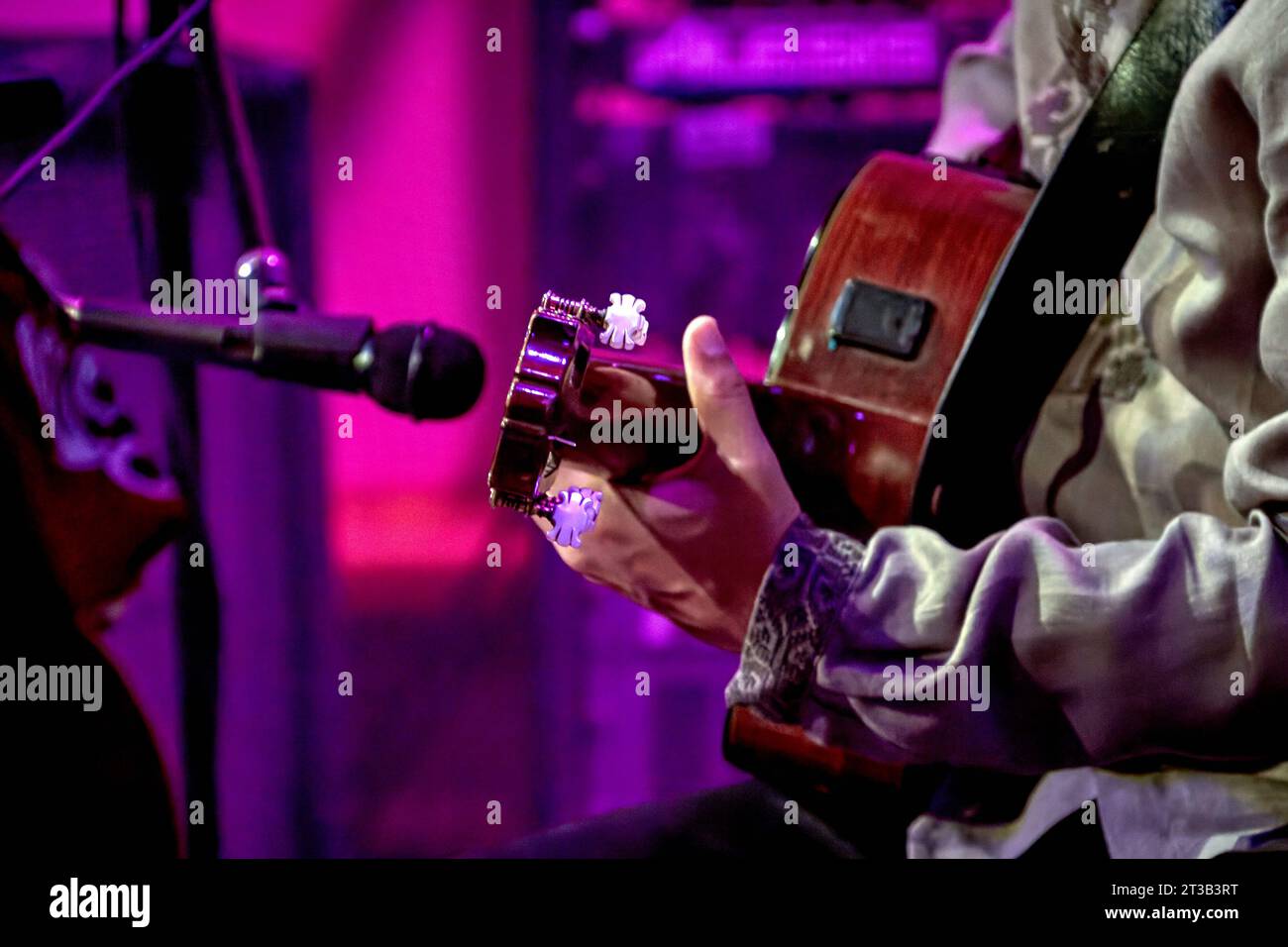 Guitar with hand and microphone hi-res stock photography and images - Alamy