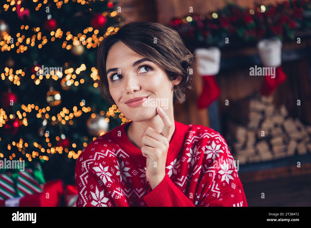 Photo of dreaming nice young santa claus helper brown hair touch finger ...