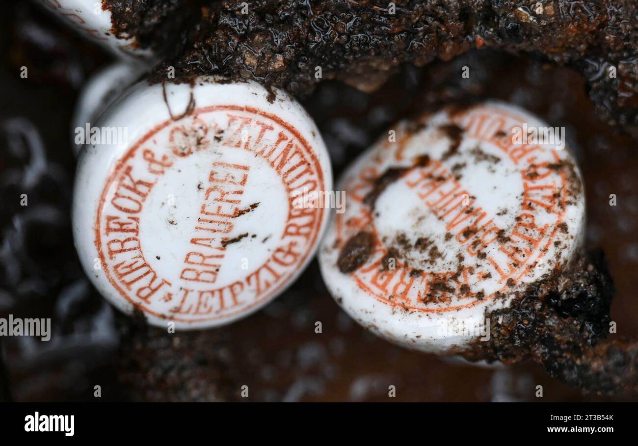 24 October 2023, Saxony, Zwickau: Closures of historical beer bottles ...