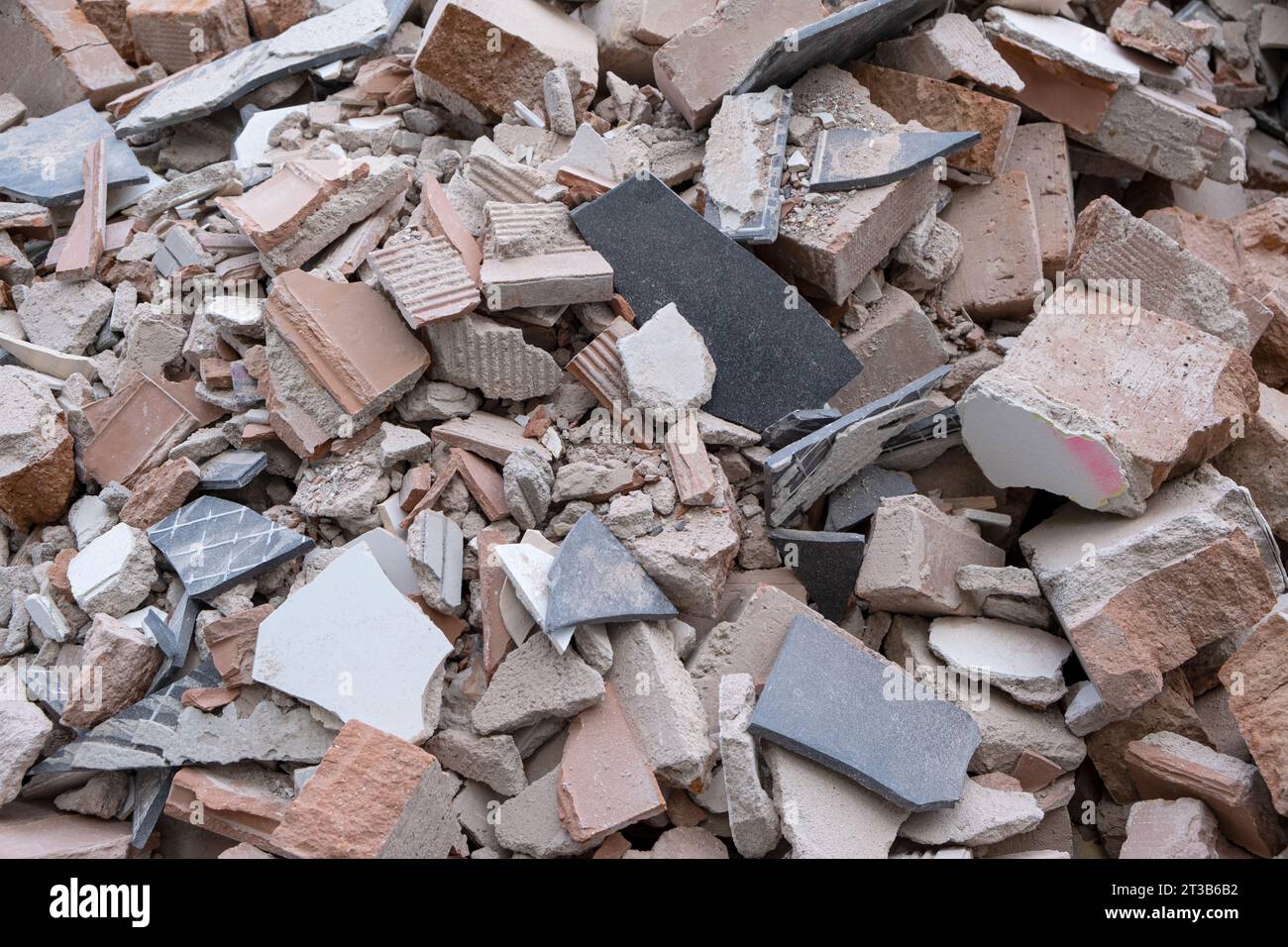 Shattered, broken red clay ceramic bricks, remnants of construction ...
