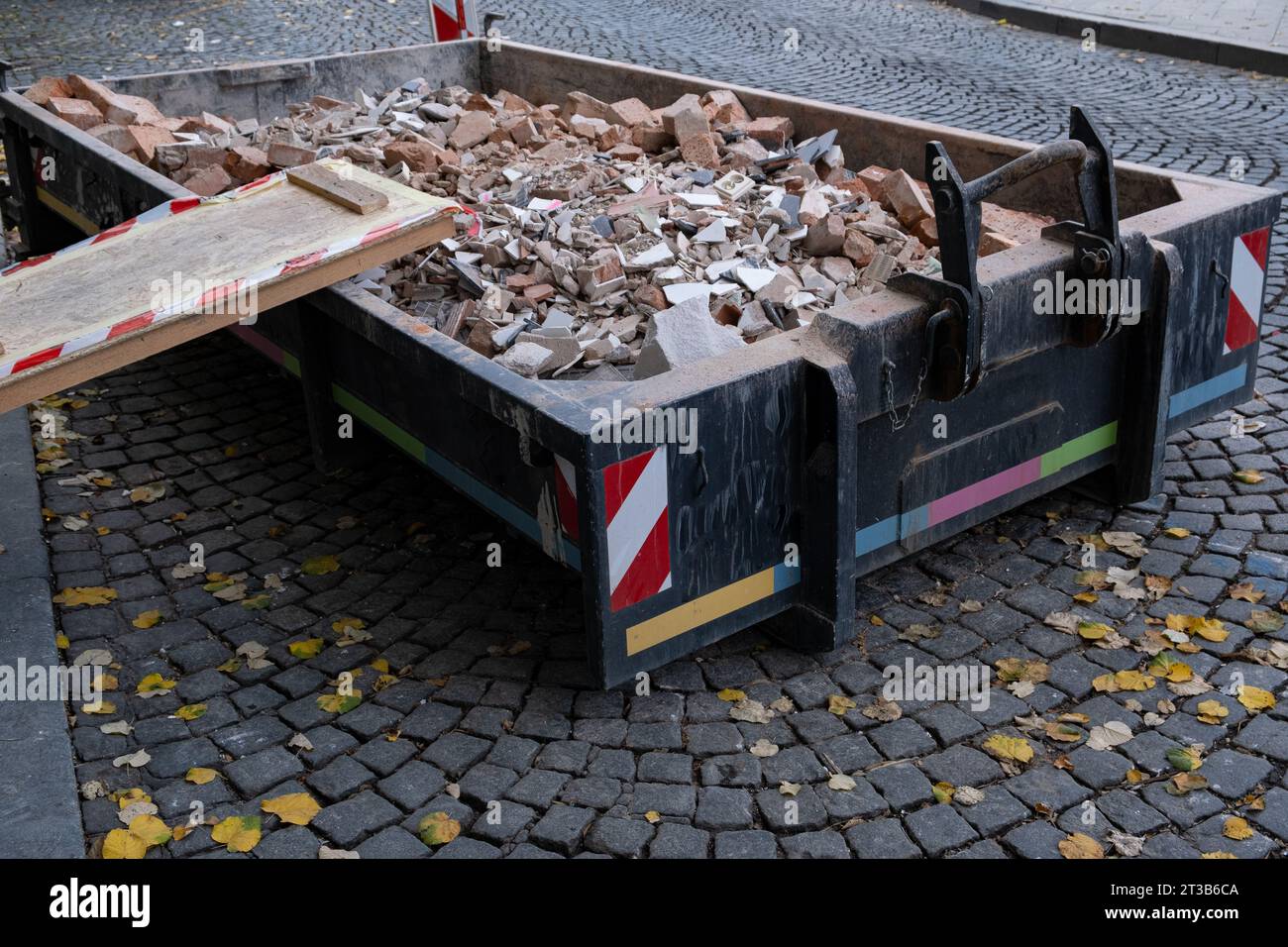 Shattered, broken red clay ceramic bricks, remnants of construction ...