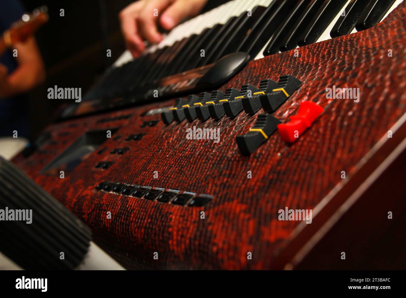close - up photo of a hand playing the synthesizer Stock Photo - Alamy