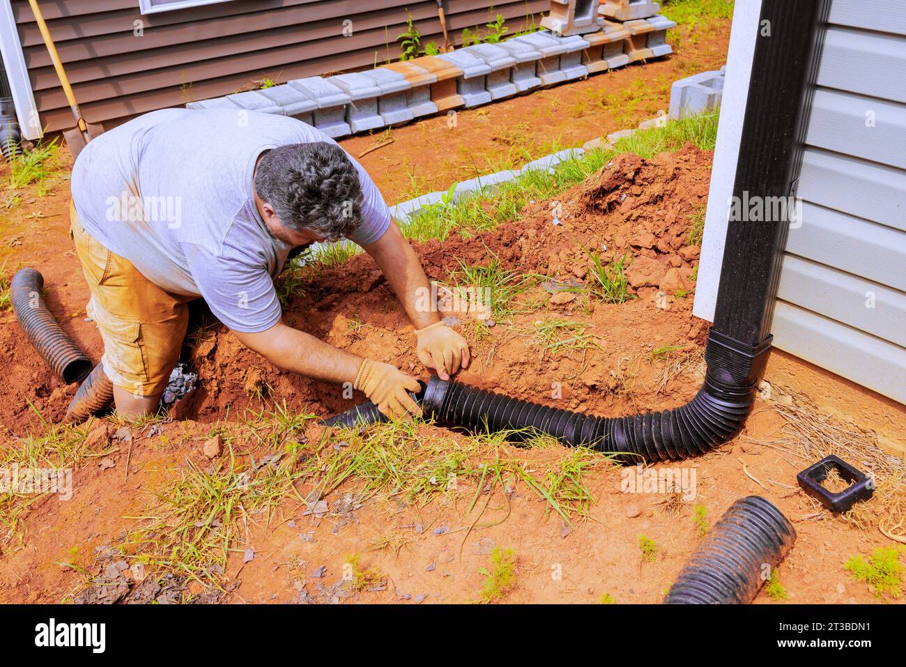 Installing downspout connector for flexible gutter extension drainage ...