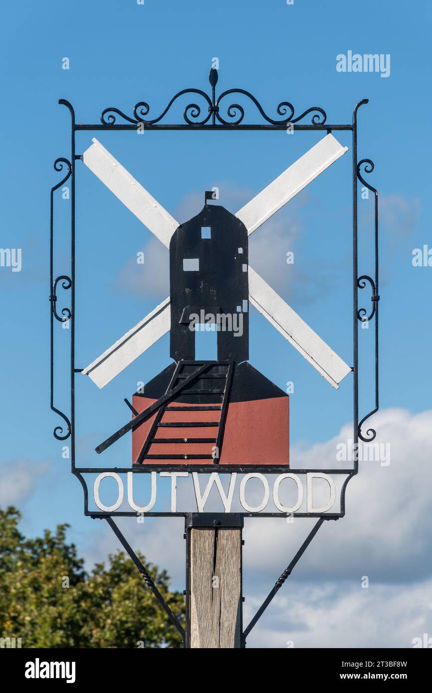 Outwood village sign, with Outwood Windmill, Surrey, England, UK Stock ...