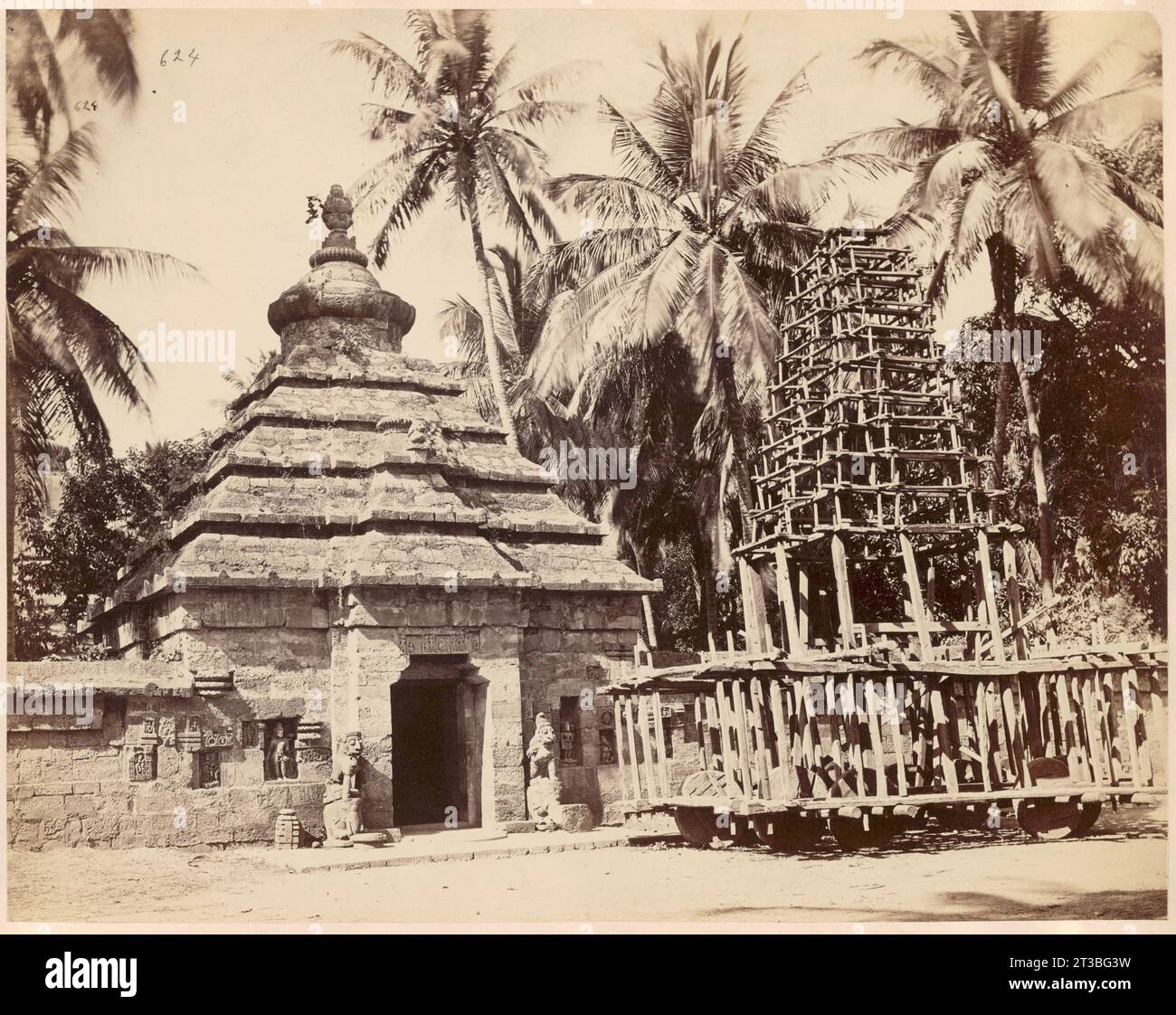 View of entrance gate to unidentified temple and large wooden structure ...