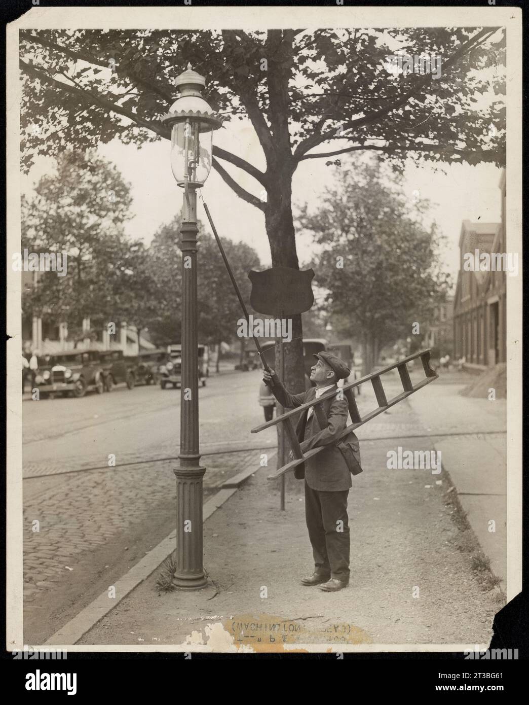 He Has Lighted 924,000 Gas Lamps, Sets 19,500-Mile Mark. Photo shows ...