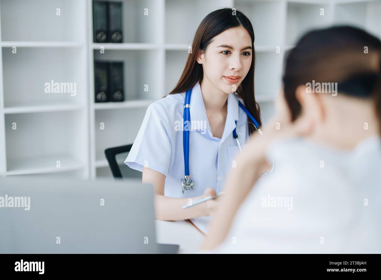 A doctor psychologist is giving counseling to a depressed patient Stock ...