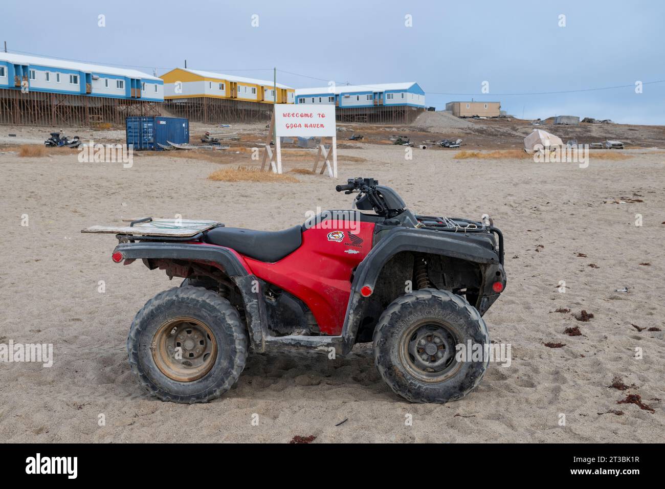 Canada, Nunavut, King William Island, Gjoa Haven. ATV with welcome sign ...