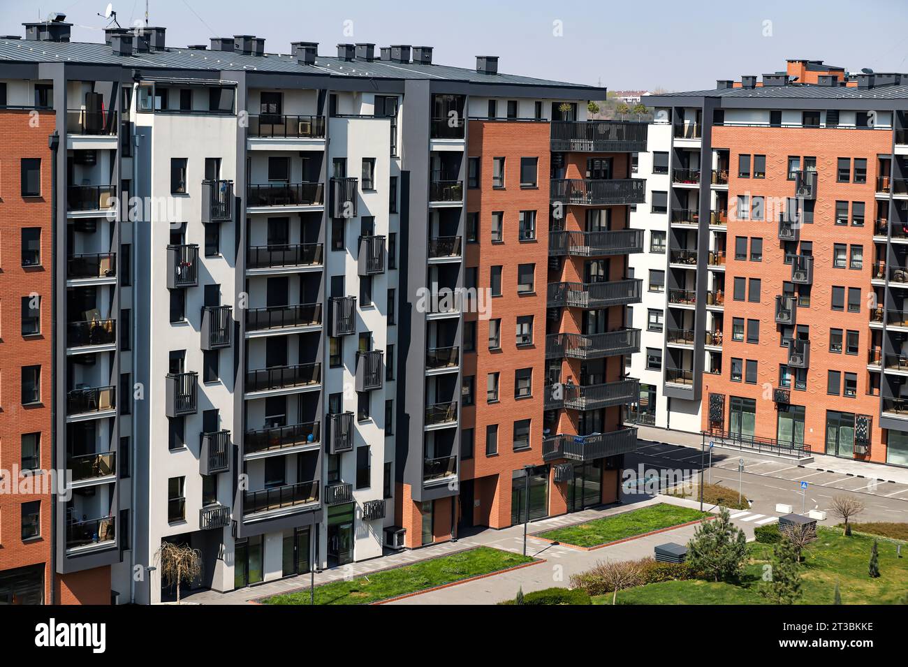 new modern building on the background of new residential buildings ...