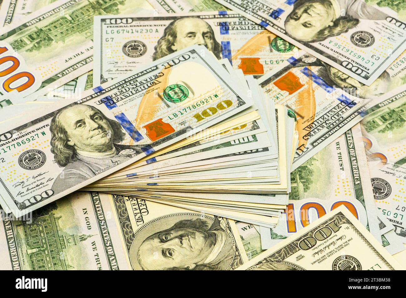 Many 100 dollar bills background hi-res stock photography and images ...