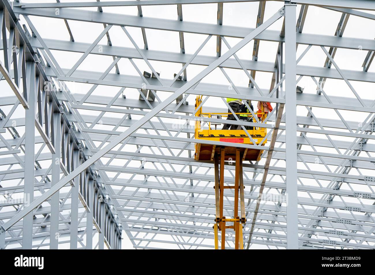 Complex large volume steel frame structure assembly using self ...