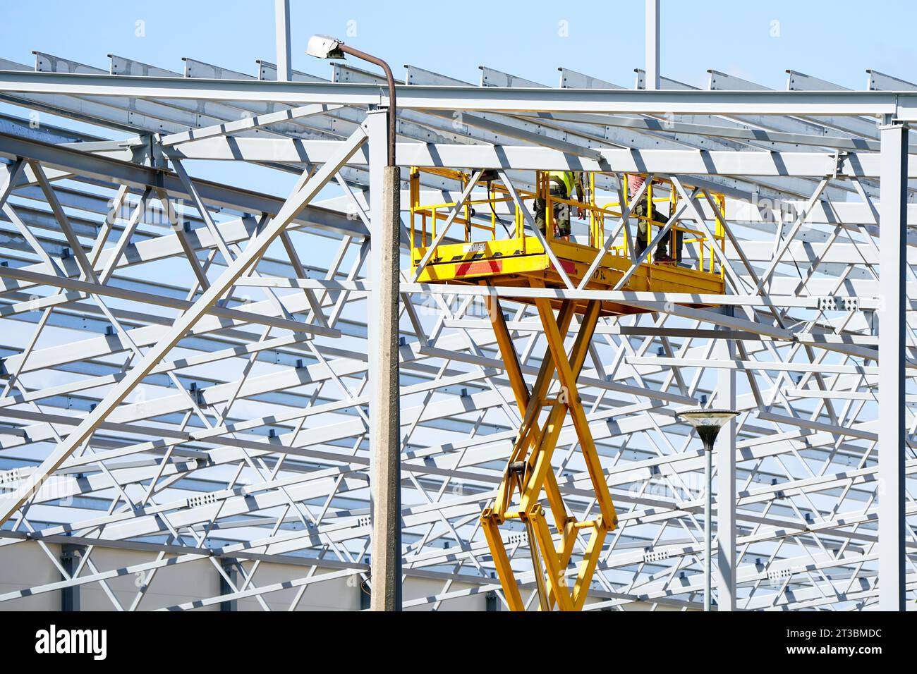 Complex large volume steel frame structure assembly using self ...