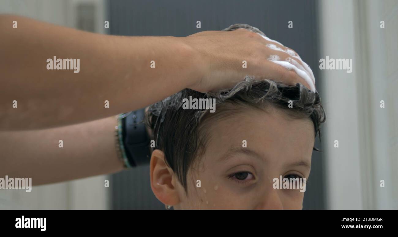 Rubbing in shampoo hi-res stock photography and images - Alamy