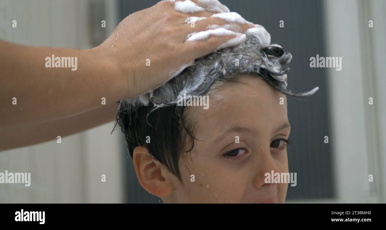 Rubbing in shampoo hi-res stock photography and images - Alamy