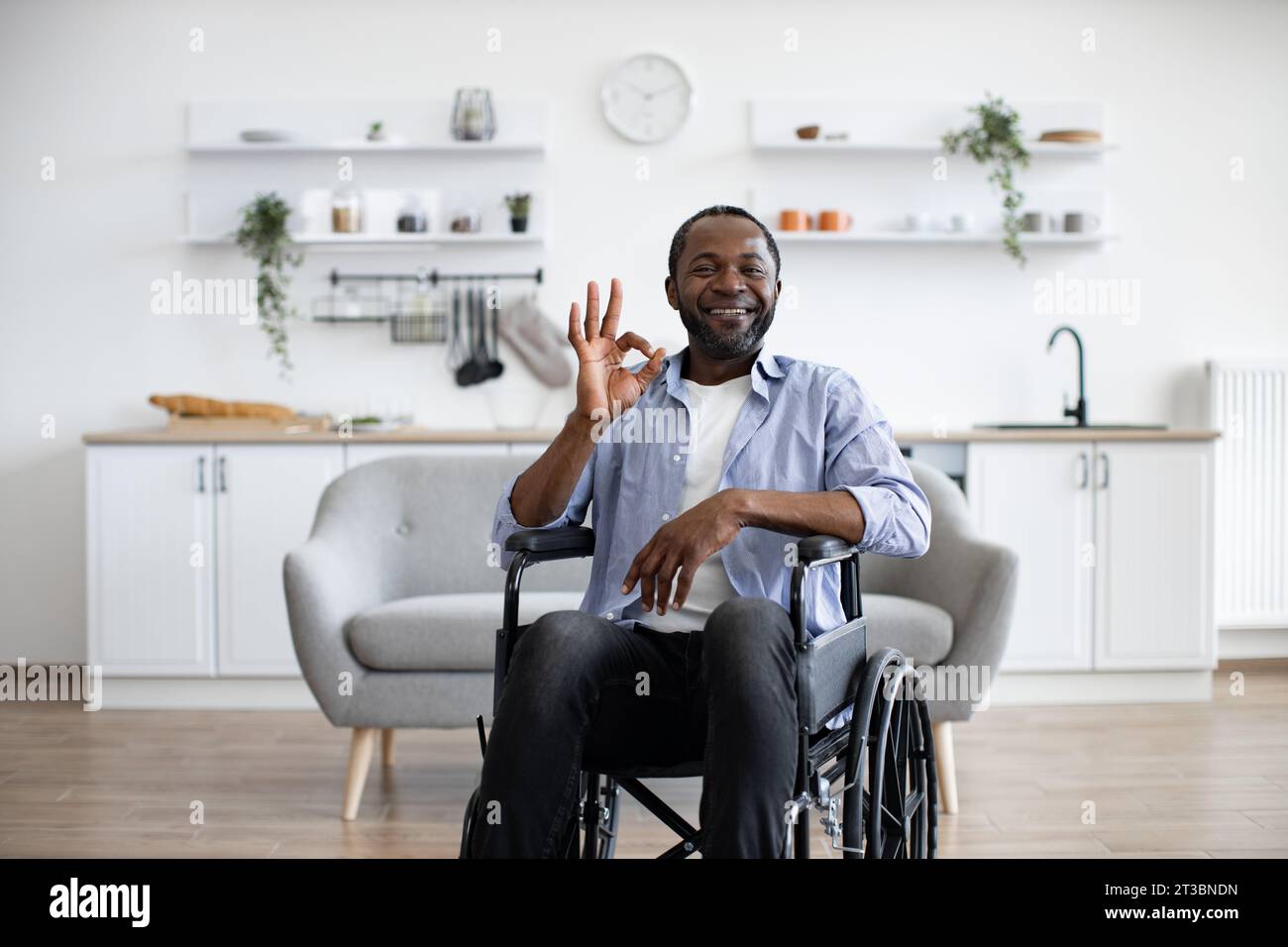 Cheerful wheelchair user in casual hi-res stock photography and images ...