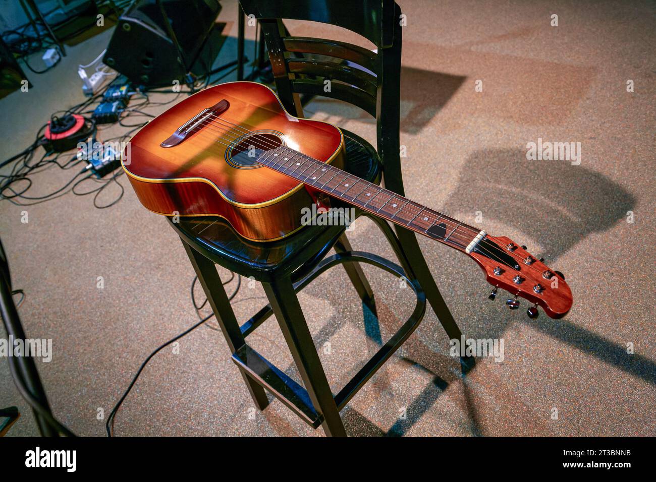 Image musical instrument acoustic guitar lies on a chair Stock Photo ...