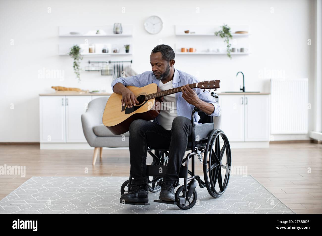 Cheerful smiling african person with disability holding string ...