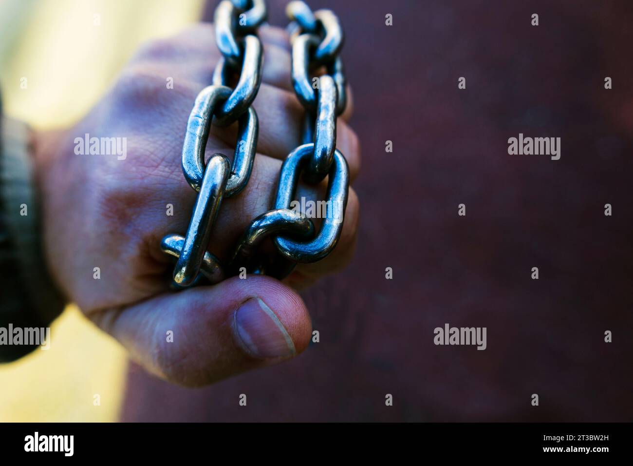 Hand with CHAIN,chain in hand,the chain wound on the hand,dirty hands ...