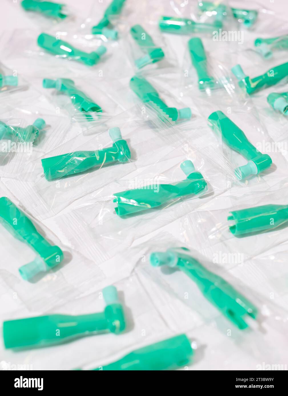 Green Disposable Prophy Angles with Brush, Ergonomic Shape on White ...