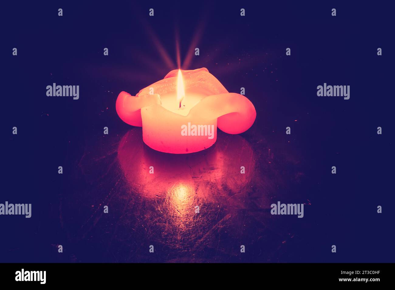 one burning candle with reflection against black background Stock Photo ...