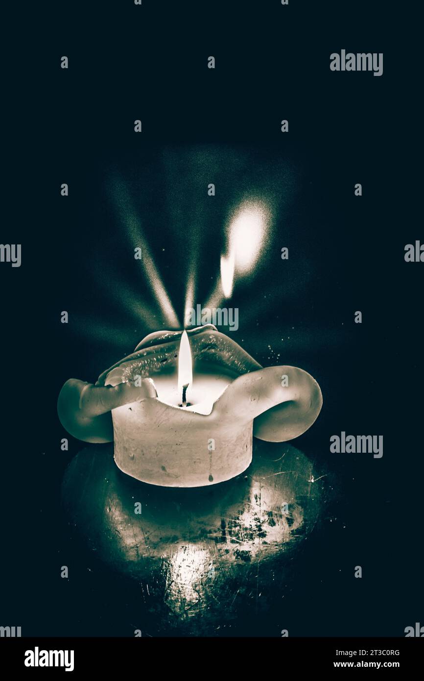one burning candle with reflection against black background Stock Photo ...