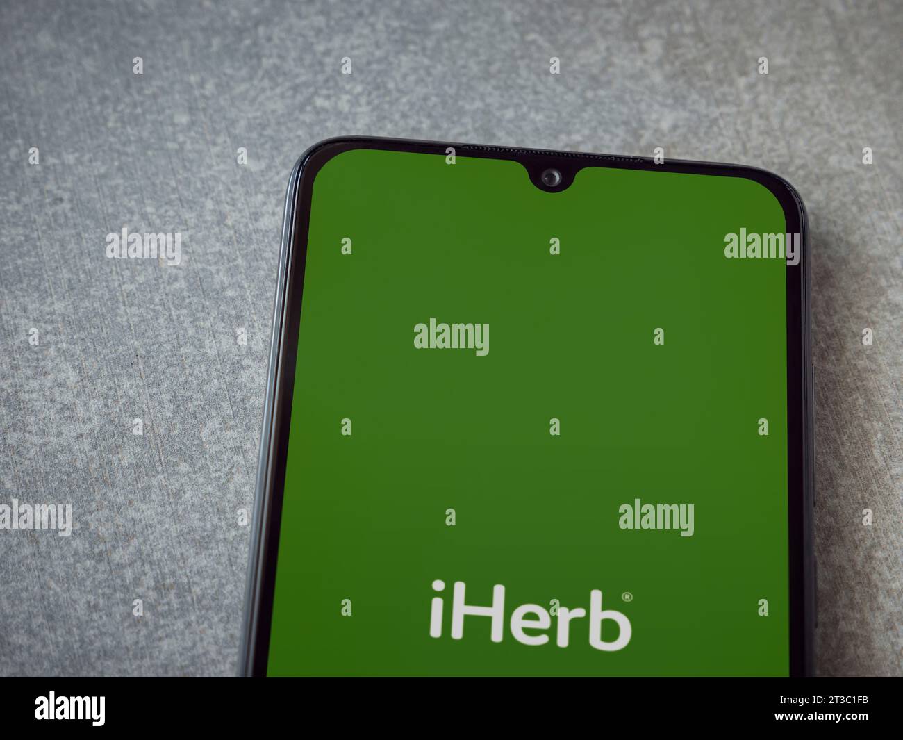 Lod, Israel - July 16,2023: iHerb app launch screen on smartphone on ...