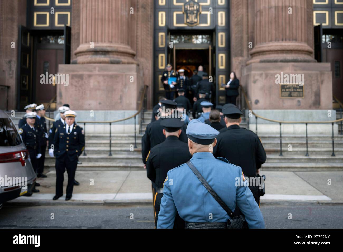 Law enforcement officers gather for a funeral service for officer ...