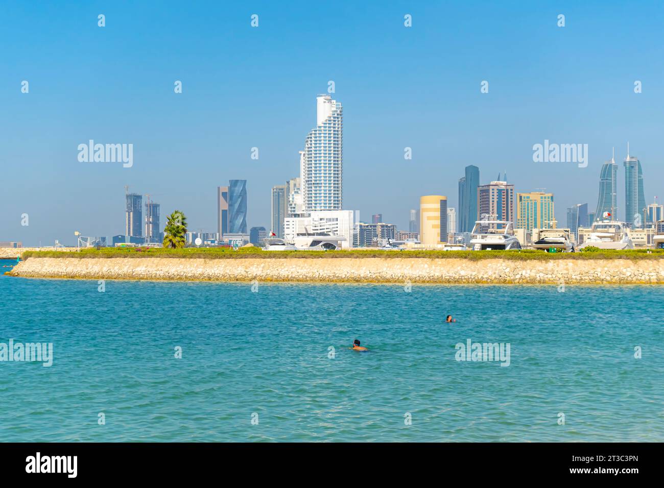 Bahrain private beach at Ritz hotel, view of Bahrain Bay skyline ...