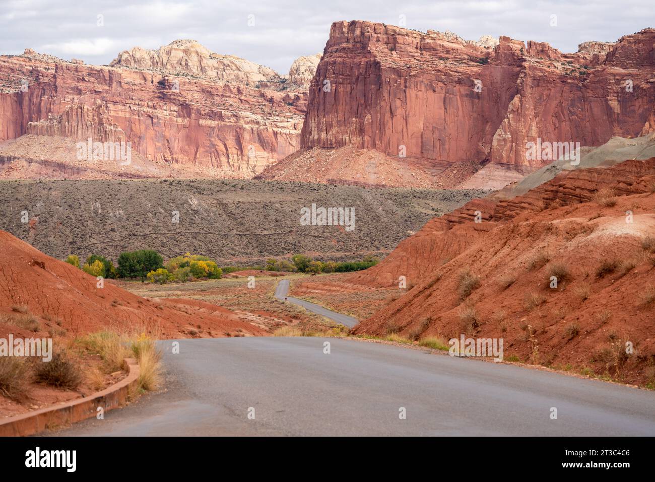 desolate desert road as sunset approaches Stock Photo - Alamy